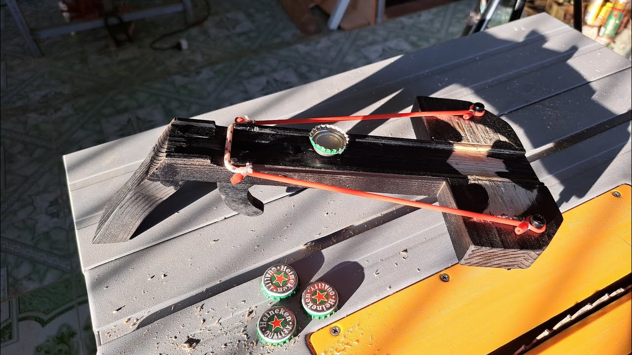 Make a Batman-Style Mini Crossbow – Shoot Bottle Caps Like a Hero ...