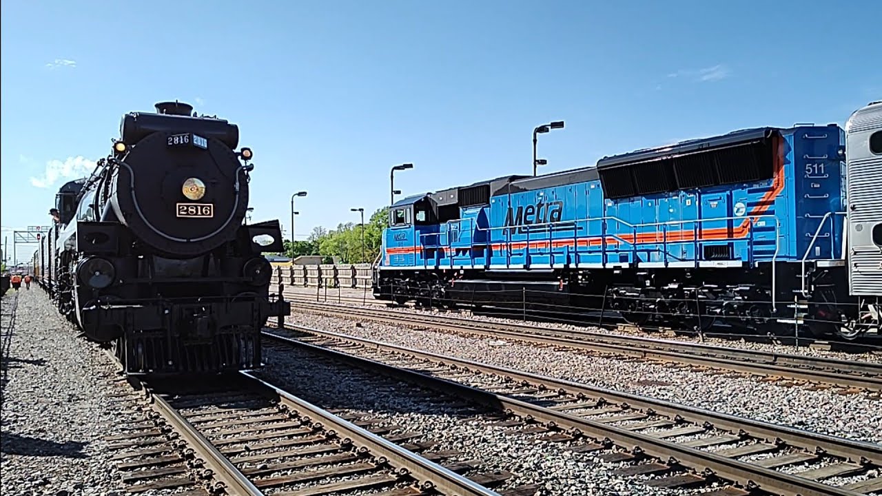 Metra SD70MACH 511 west meets Canadian Pacific 2816 at Franklin Park, Illinois on May 8, 2024 ...