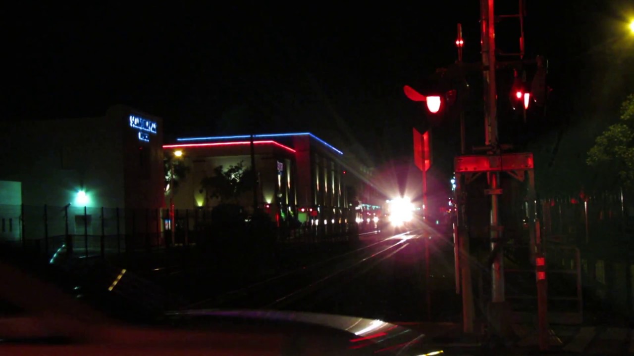 Caltrain Train Passing through San Mateo at Night - YouTube