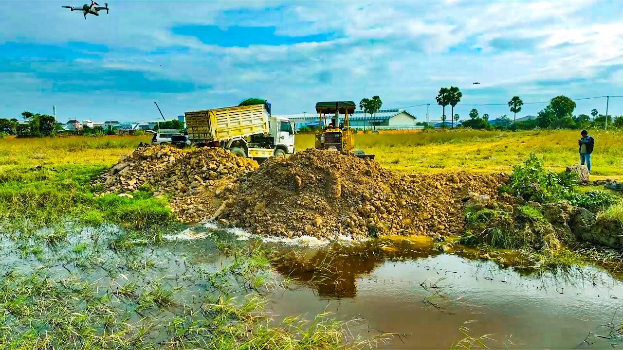 Full video Landfill up Process by 5T truck unloading soil with Dozer ...