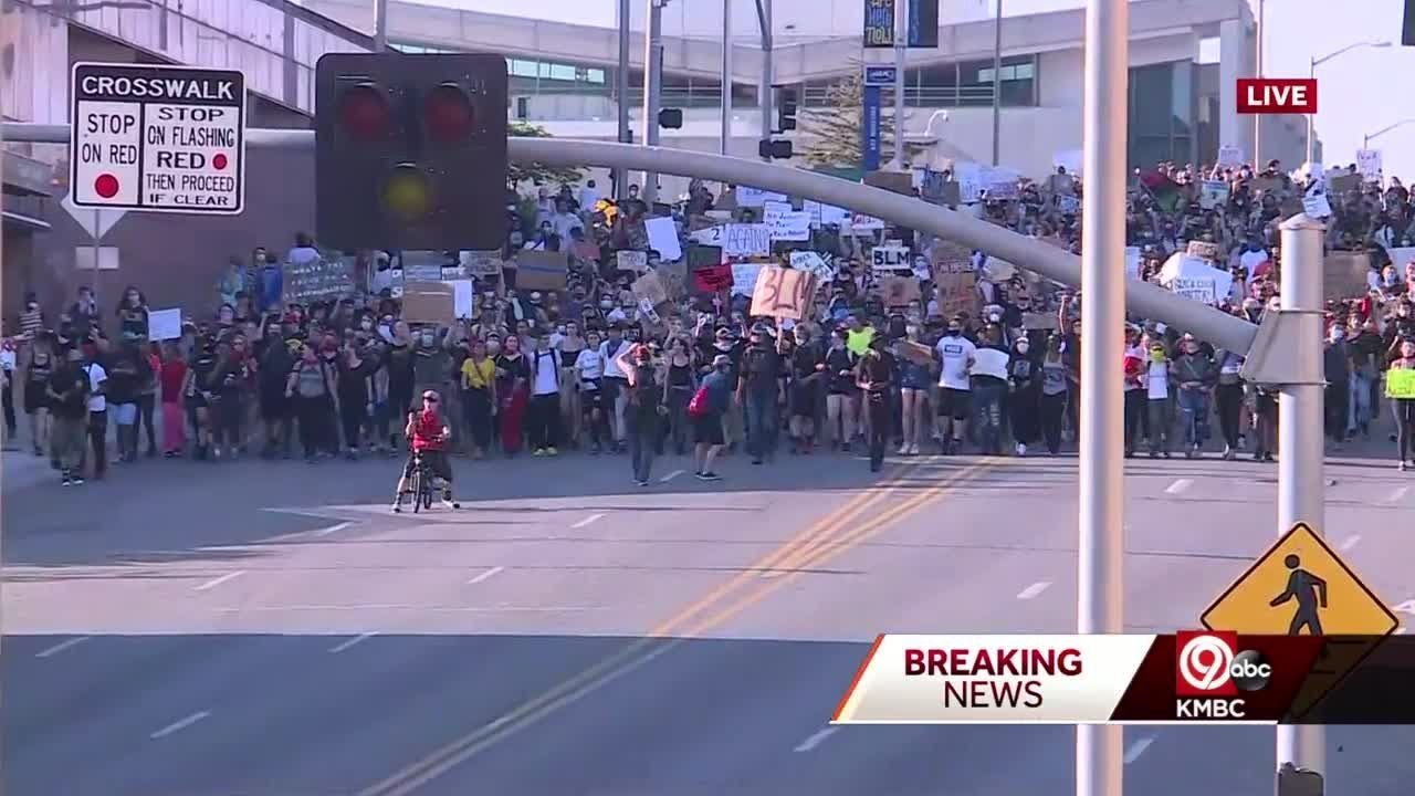 Sunday protest shifts to march through Kansas City - YouTube