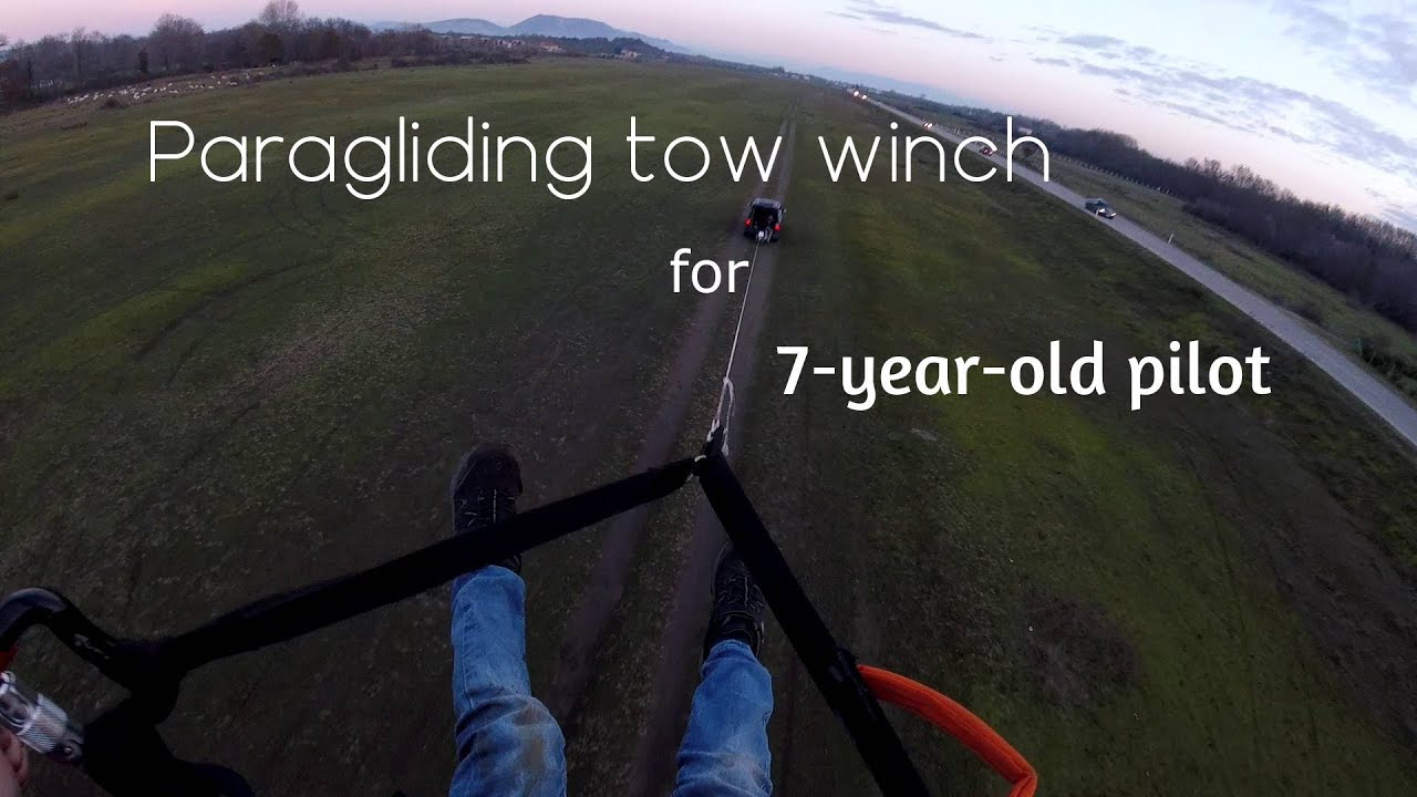 Paragliding towing with the young pilot 7 years old - YouTube