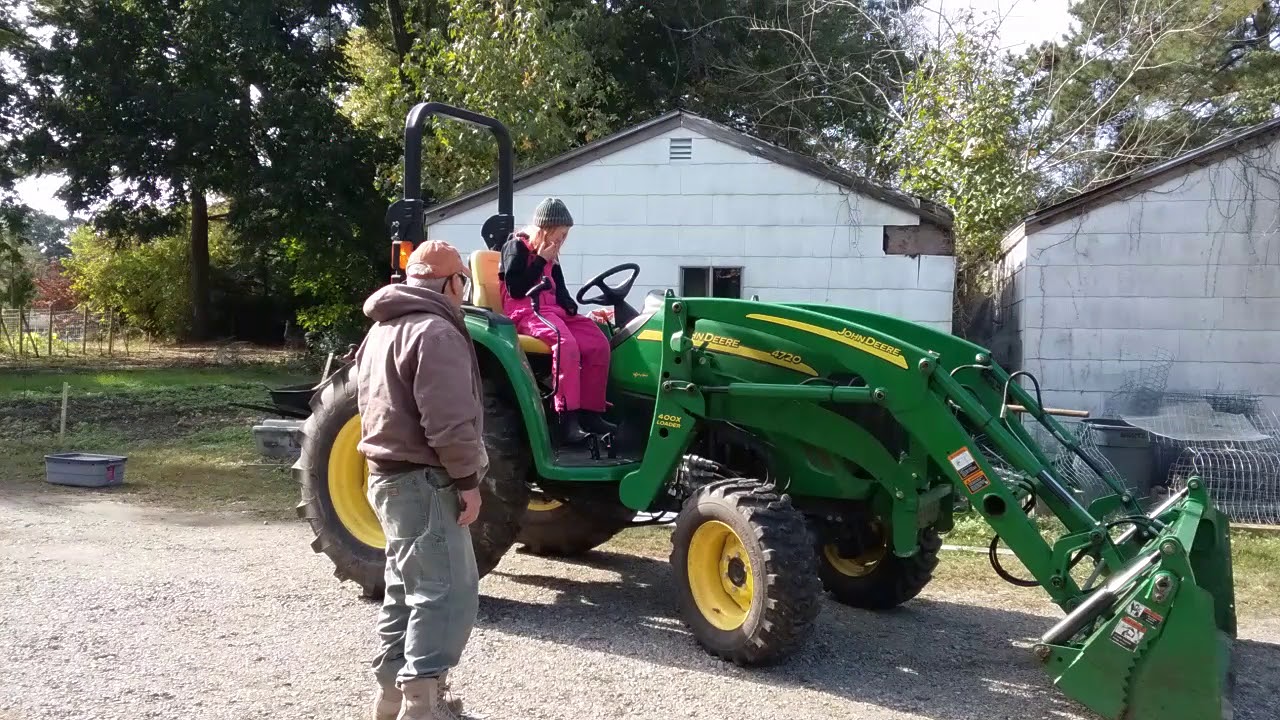 Farm girl driving tractors - YouTube