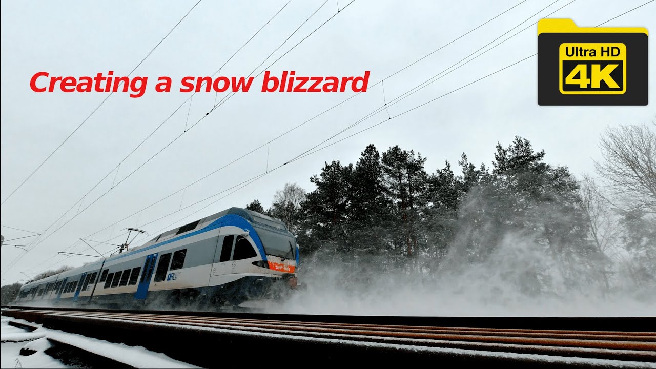 High speed trains passing by create a snow blizzard - YouTube