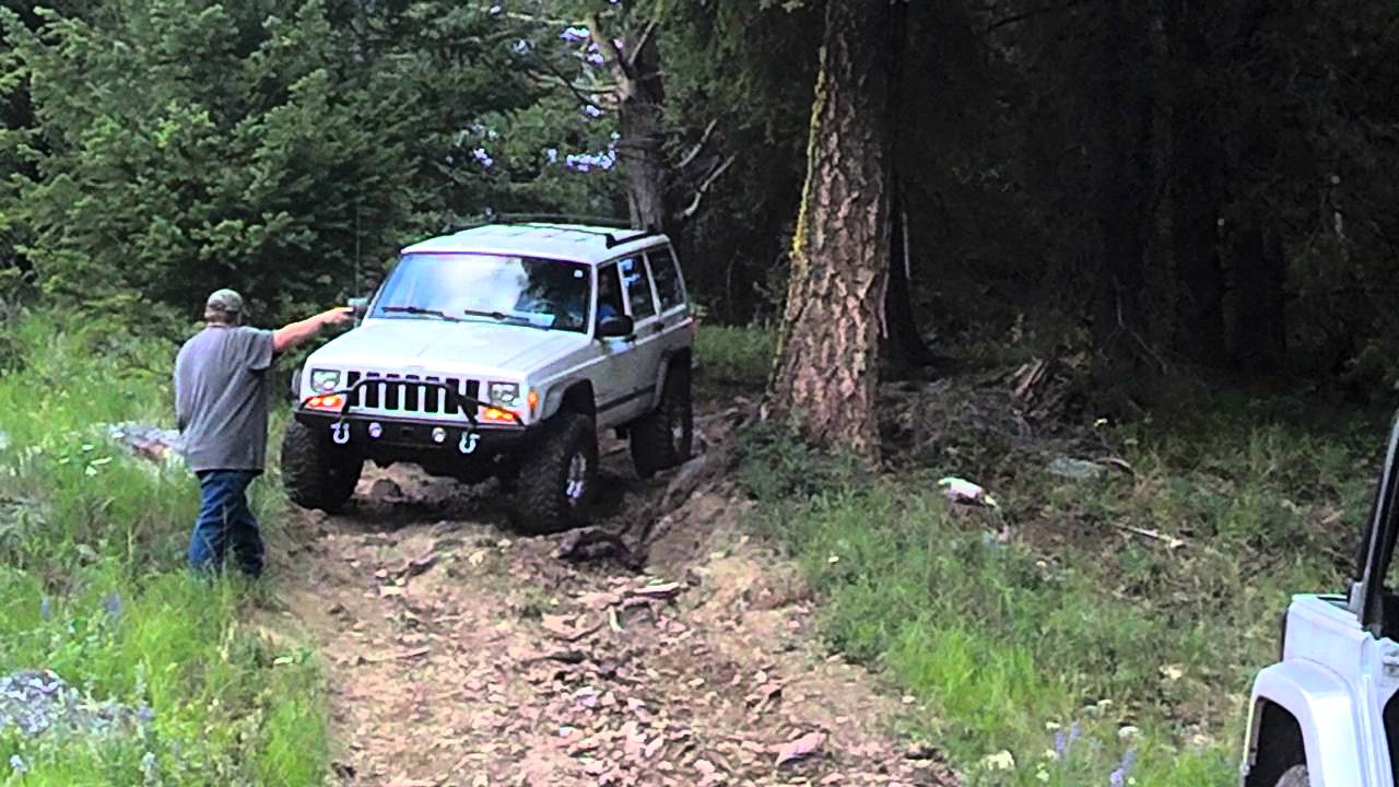 Lifted Jeep Cherokee Going Down Root System - YouTube