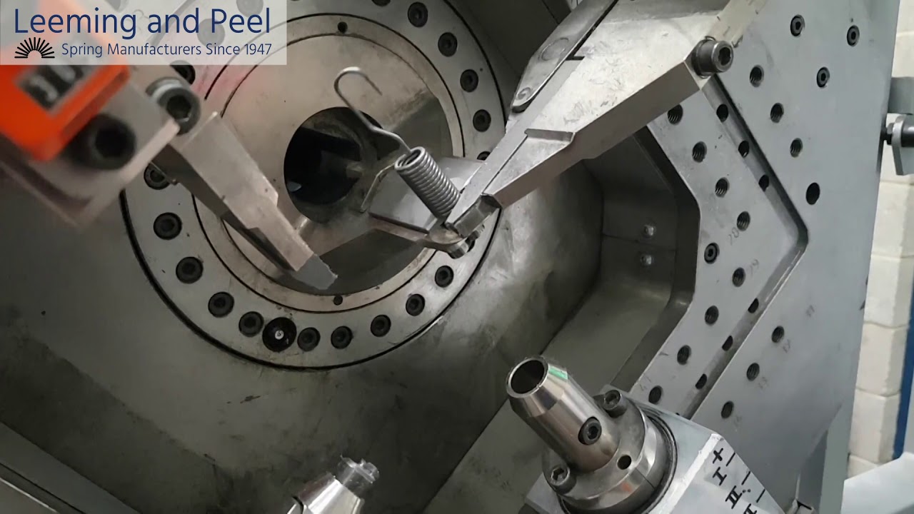 Wafios CNC coiler forming a Extension Spring - YouTube