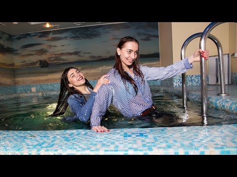WET FUN: GIRLFRIENDS WET THEIR CLOTHES BY THE POOL AND SWIMMING IN IT [WETLOOKER ID: vk1891-couple]