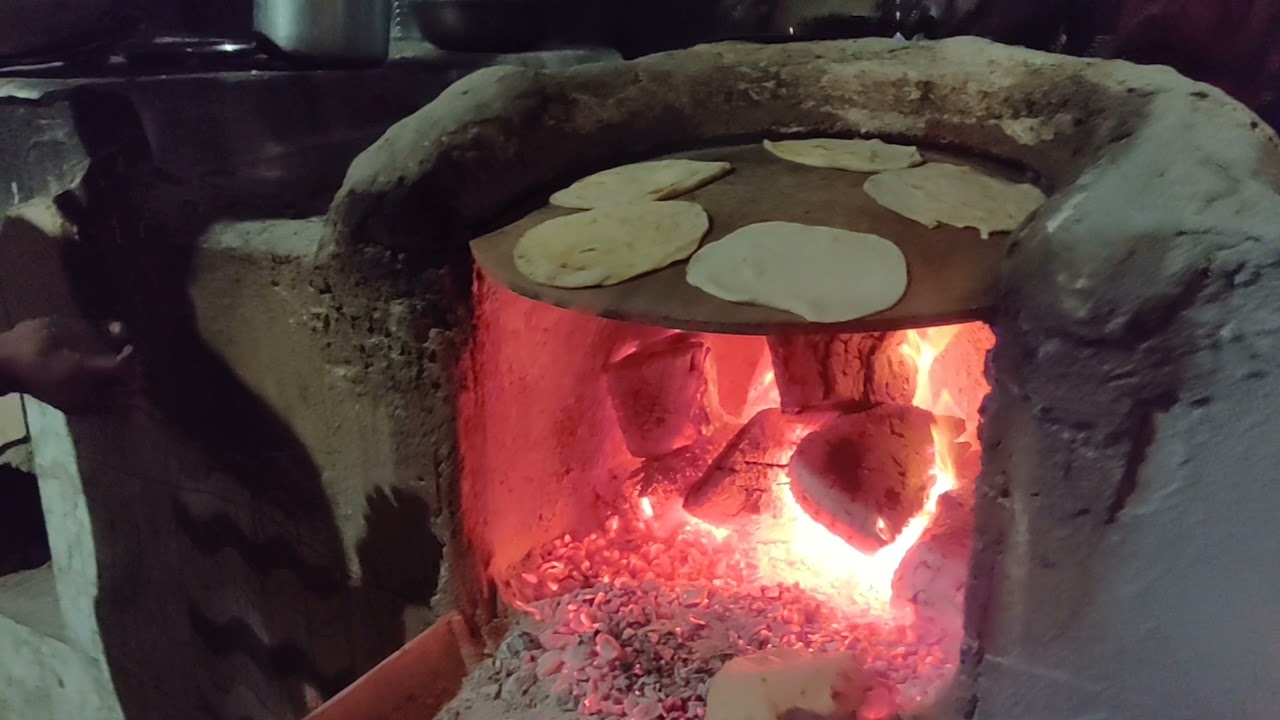Best Chapati cooking technique in a traditional Wood fire oven🔥🔥 ...