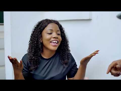 Madam seems to be jealous seeing his gateman with another lady