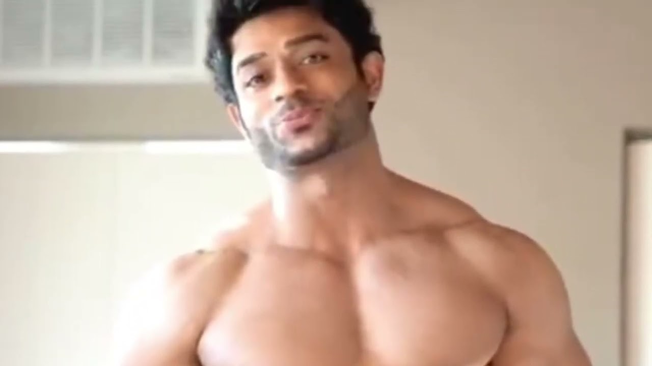 presenting AJ - big fitness model poses and flexes muscles - YouTube