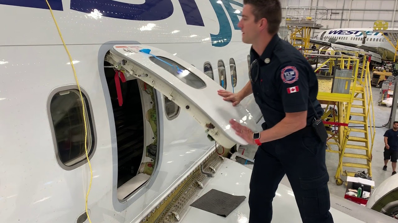 ARFF Training - 737 700 over wing exit - YouTube