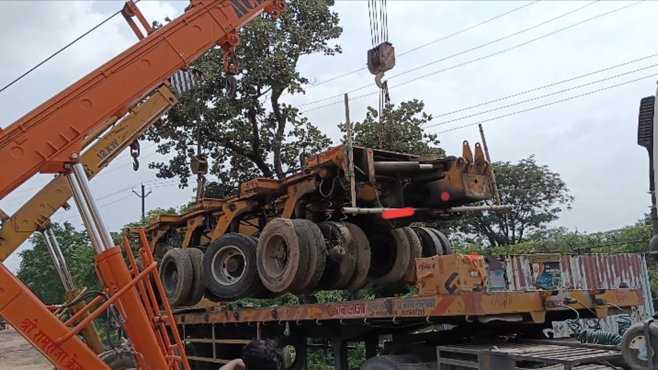 Two hydra unloading heigh weight truck wheels at BHL jhansi - YouTube