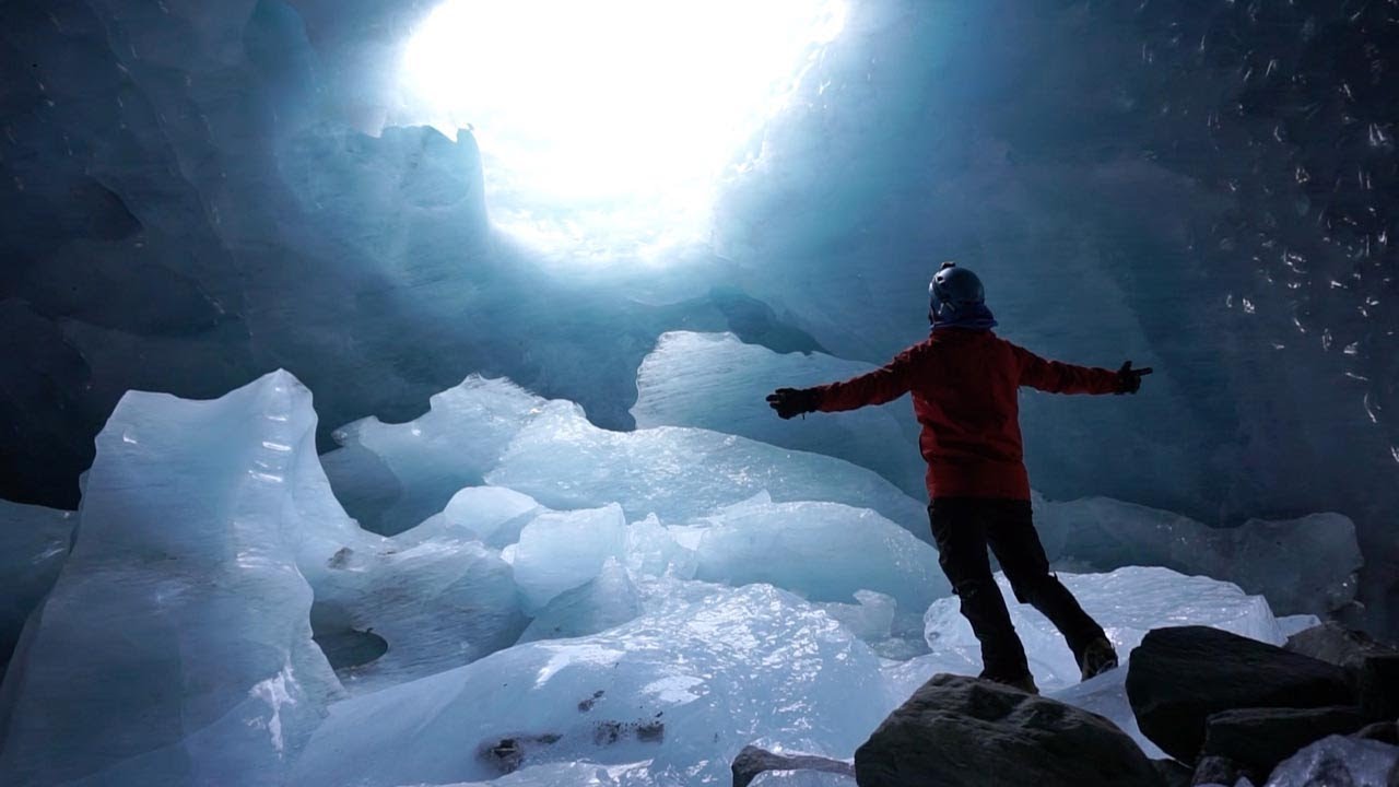 Explorers Walk Through Stunning Ice Caves - YouTube