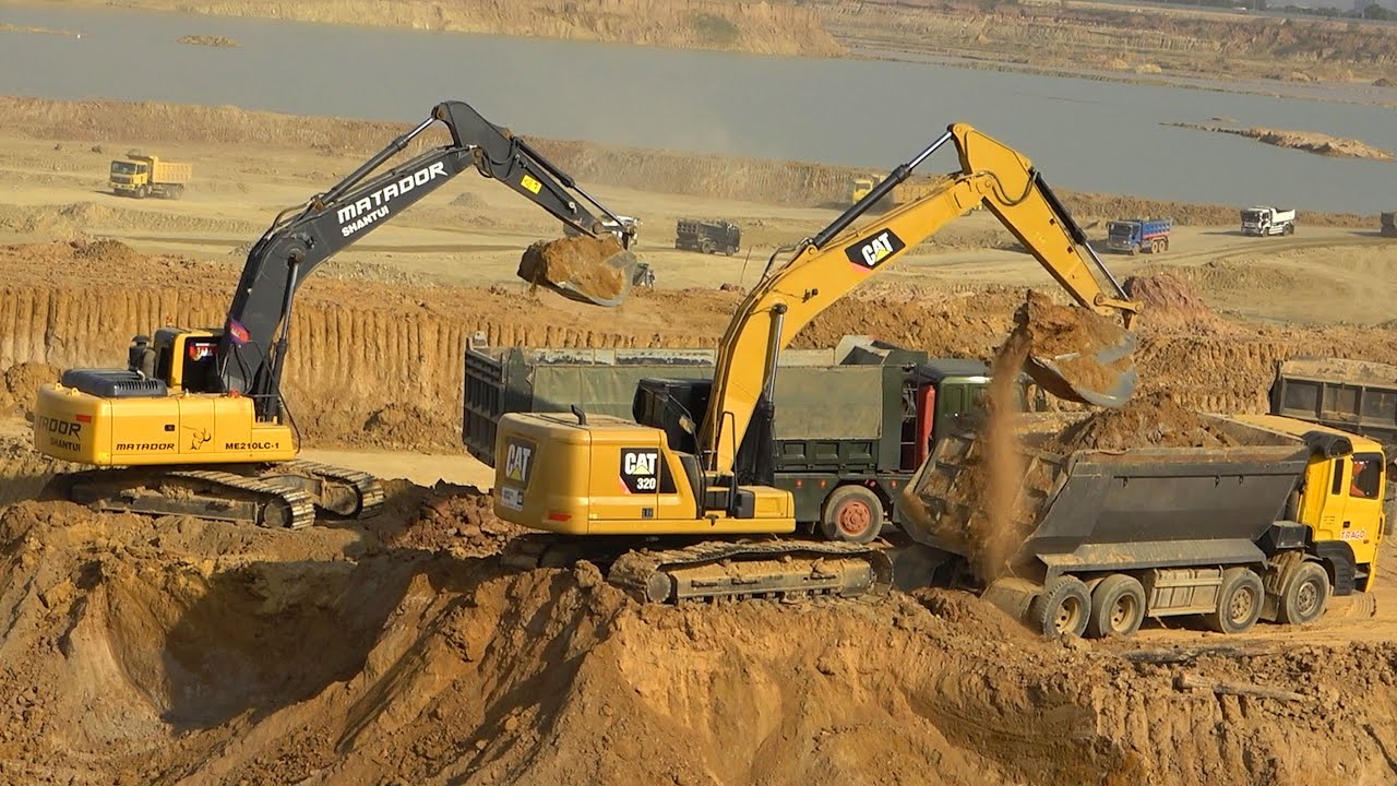 Caterpillar 320 Vs Matador 210 Excavator Working With Dump Trucks - YouTube