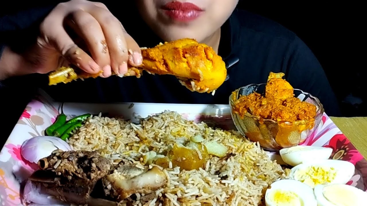 ASMR eating spicy mutton biryani, chicken curry, chicken leg piece ...