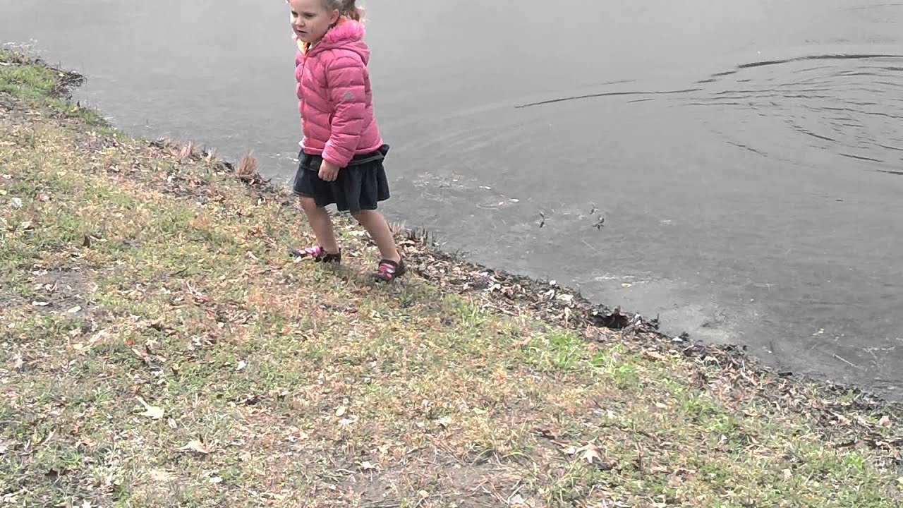 Kids throwing rocks in the pond - YouTube