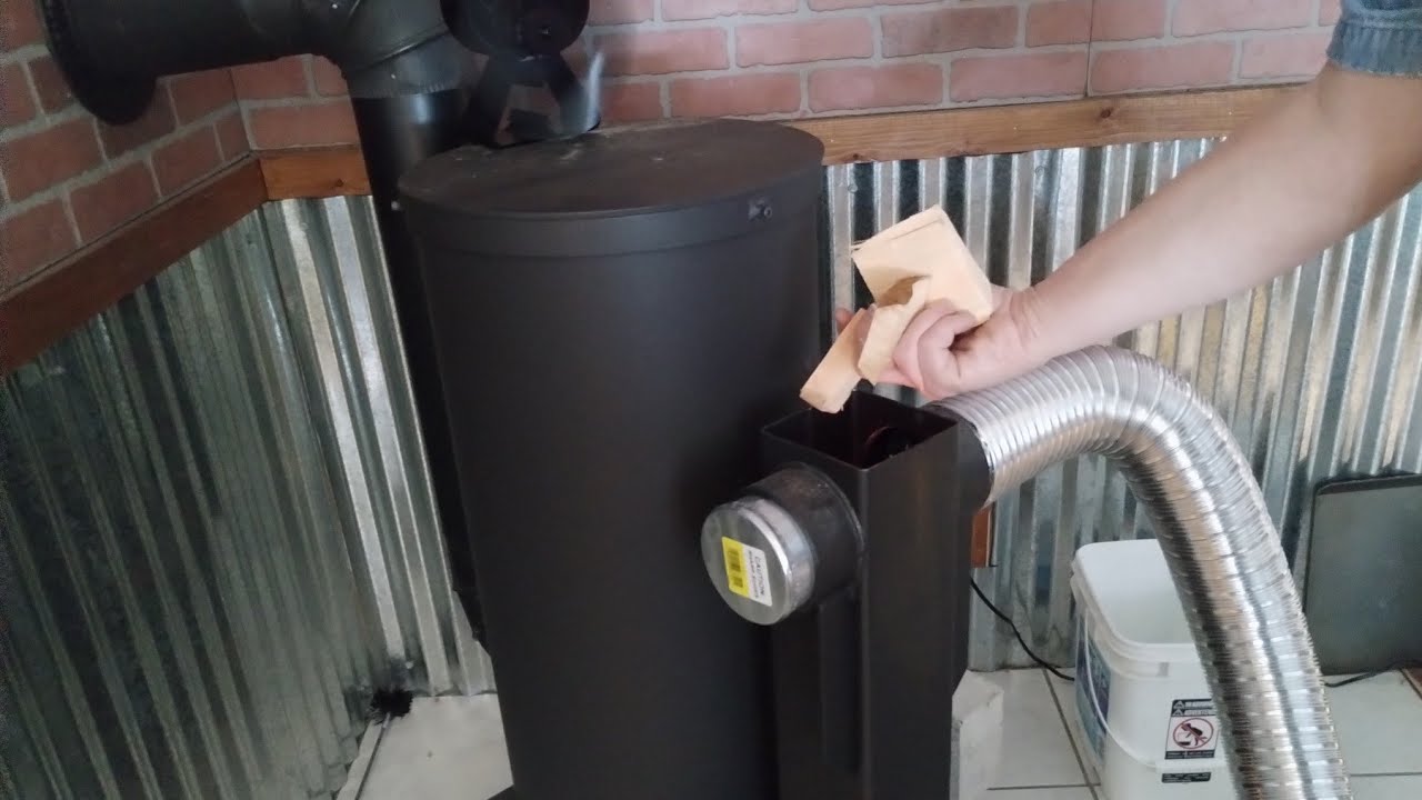 Liberator Rocket Heater, chunking your firewood. - YouTube
