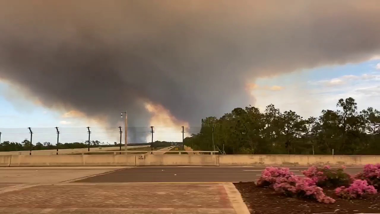 Brush Fires Burn in the Distance in Naples, Florida - YouTube