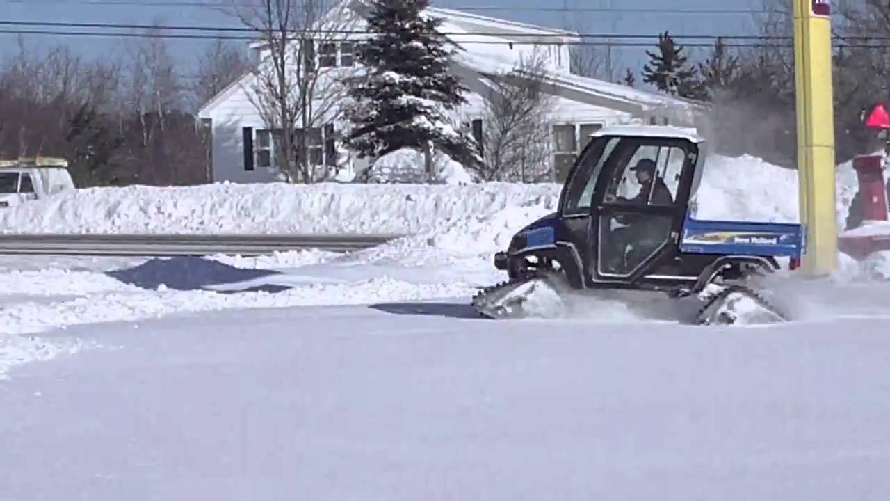 New Holland Rustler 125 with Tracks - YouTube