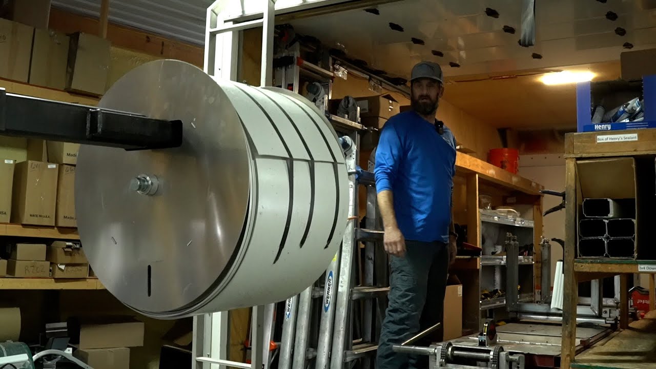 How to load a gutter coil on to your gutter machine - YouTube