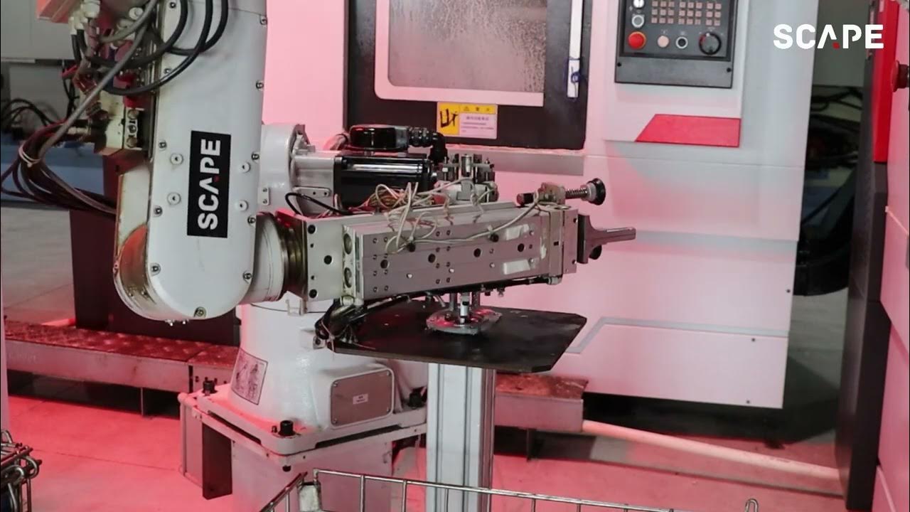 SCAPE CNC Machine Tending Solution Handling Valve Covers at TNDA - YouTube