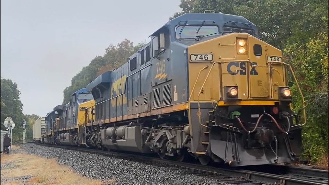 CSX M436 sneaks up on me with lots of fresh cars and 746, 467, 6249, and 3198 leading - YouTube