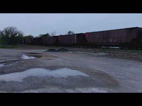 Ex SP/Gevo/AC4400. UP 6334 and UP 5338 lead a 2x1 UP WB slow empty EGSK coal train back west ...