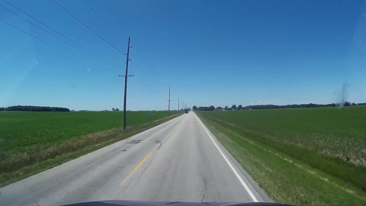 Distracted driver hits semi truck - YouTube