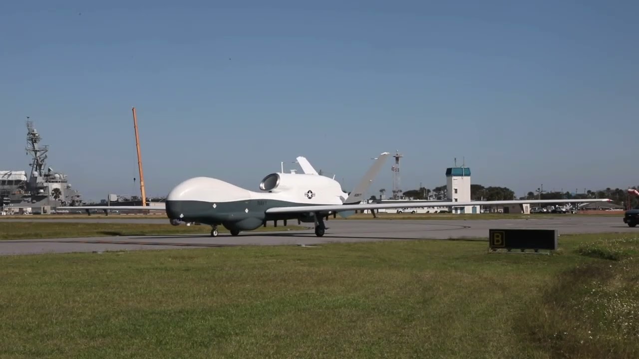 MQ-4C Triton Unmanned Aircraft System (UAS) lands at Naval Station ...