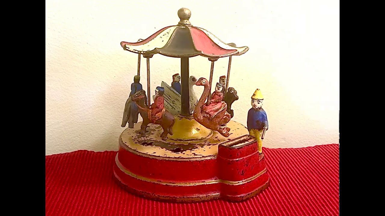 "MERRY-GO-ROUND" Original Antique Mechanical Bank - YouTube