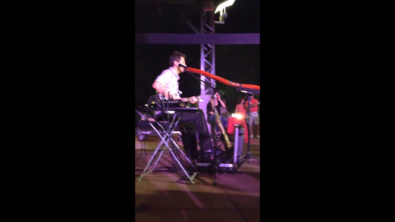 Amazing musician playing many instruments and throwing guitar picks ...