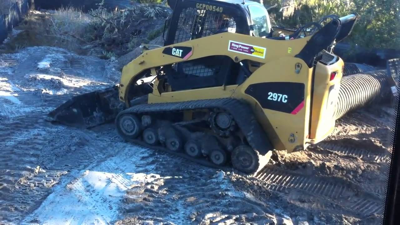 Caterpillar 297C posi track - YouTube