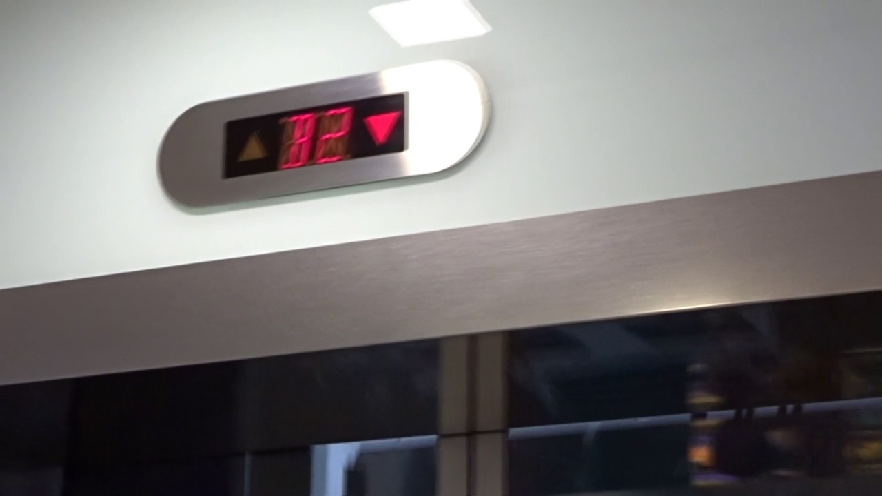 Toshiba glass elevator at Bugis Junction - YouTube