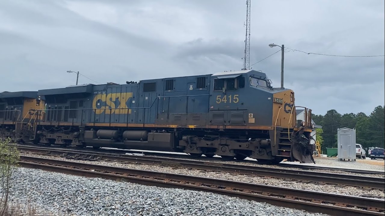 CSX M580 departs with CSX 343 leading and an SD40-2 trailing on 5-27-23 ...