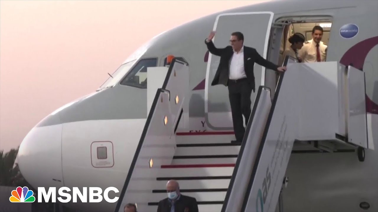 'Momentous moment': See Americans freed from Iran get off plane - YouTube