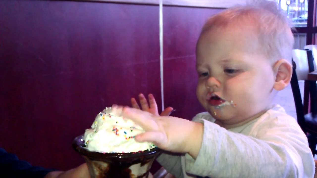Desmond- 1 year enjoying his red robin sundae - YouTube