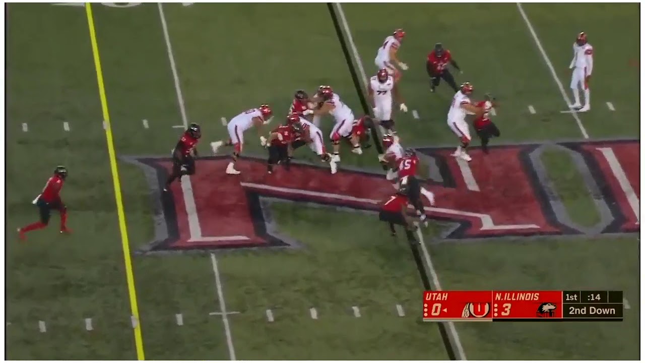Jackson Barton (LT, #70) reroutes inside move to open run lane vs. NIU ...