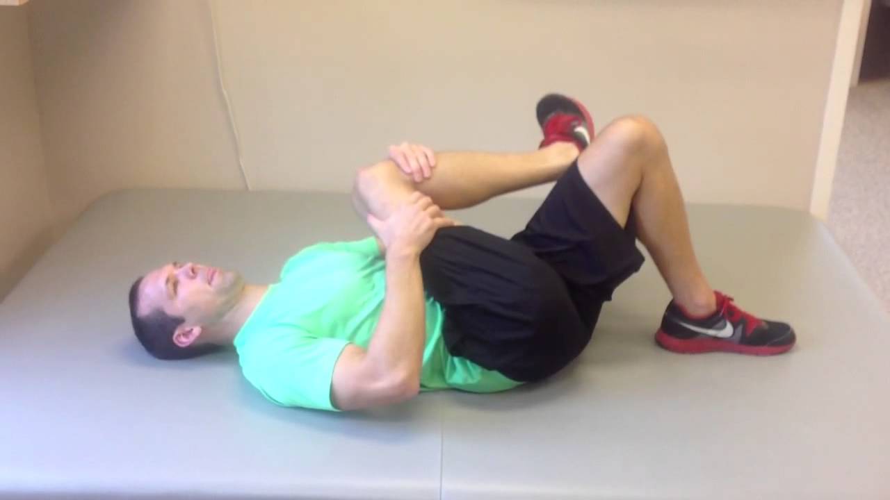 Supine piriformis stretch - YouTube