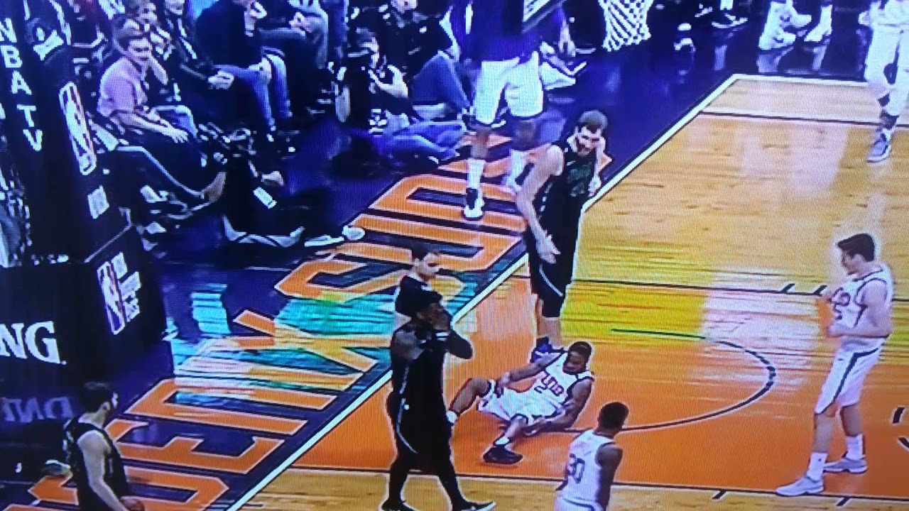 Leg Dangles , Broken leg NBA Isaiah Canaan Ref walks over him doesn't ...