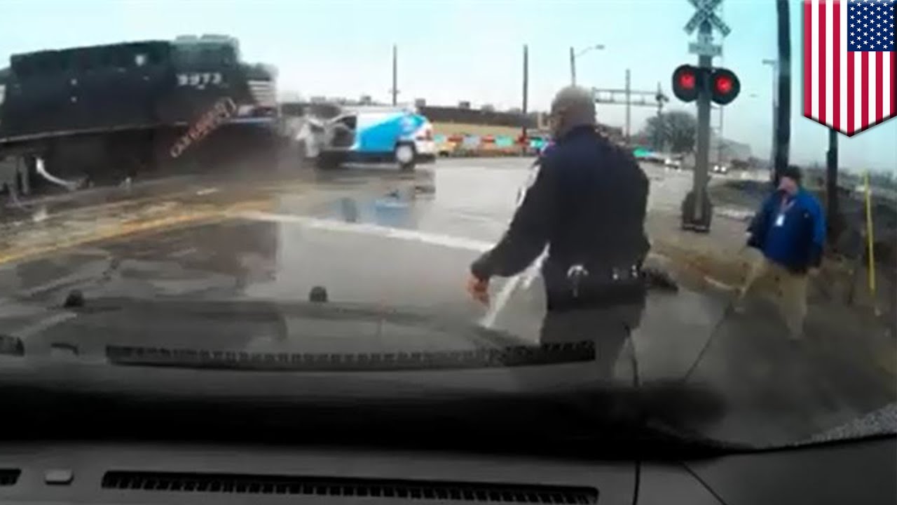 Dash cam footage shows train collision with van seconds after officer ...