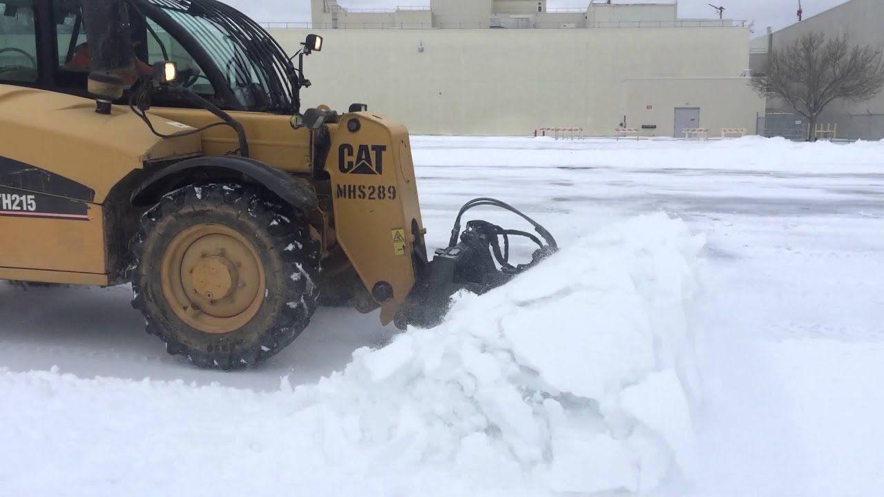Cat TH-215 pushing snow in Asheboro NC - YouTube