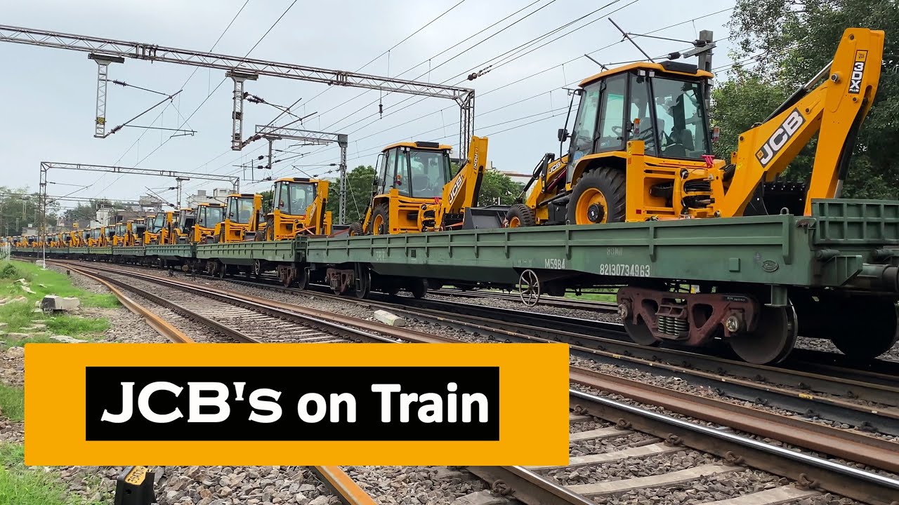 Two Trains OVERTAKES BOMN Rake Freight Train | JCB's on Train | WAP-7 ...
