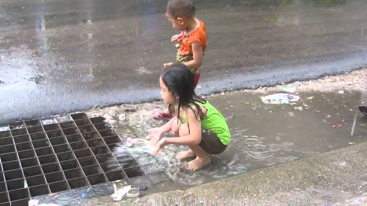 Children playing in the drain - YouTube