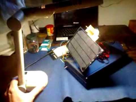 Painel solar automatizado com seguidor solar. / Solar panel with ...