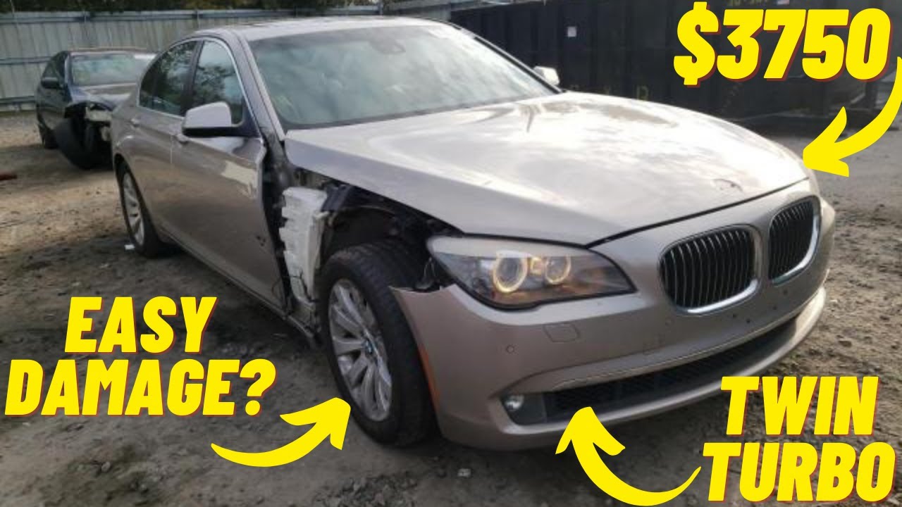 REBUILDING A BMW 750 XI START TO FINISH BUDGET BUILD AUTO AUCTION - YouTube