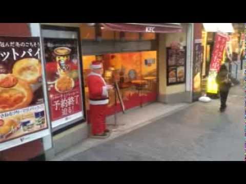 KFC Colonel Sanders changes his clothes into Santa Claus at ...
