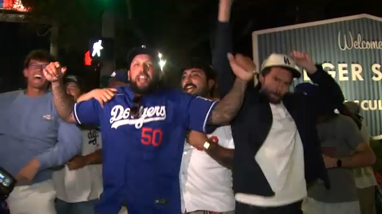 Fans outside Dodger Stadium ecstatic after seeing Dodgers win pennant ...