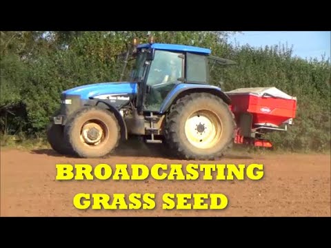 BROADCASTING GRASS SEED AND TRACTOR RACING - YouTube