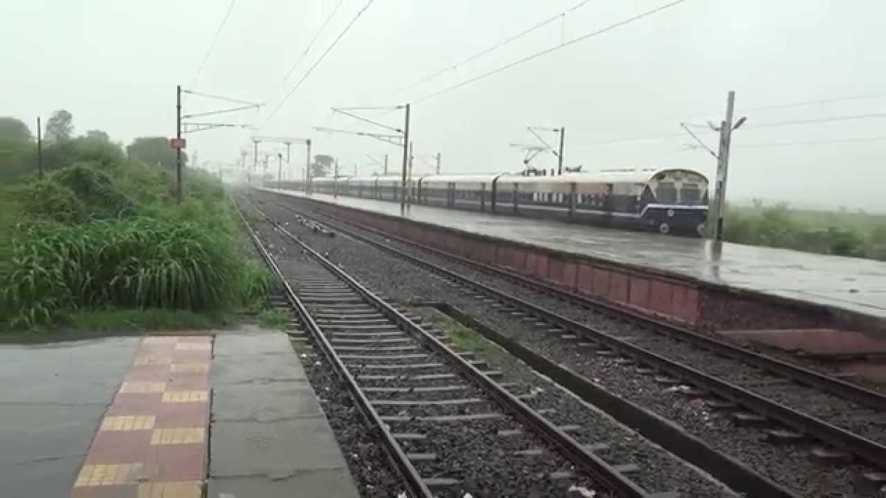 Superfast Karnavati Express & Memu taken in Lashing Rains at Kelve Road ...