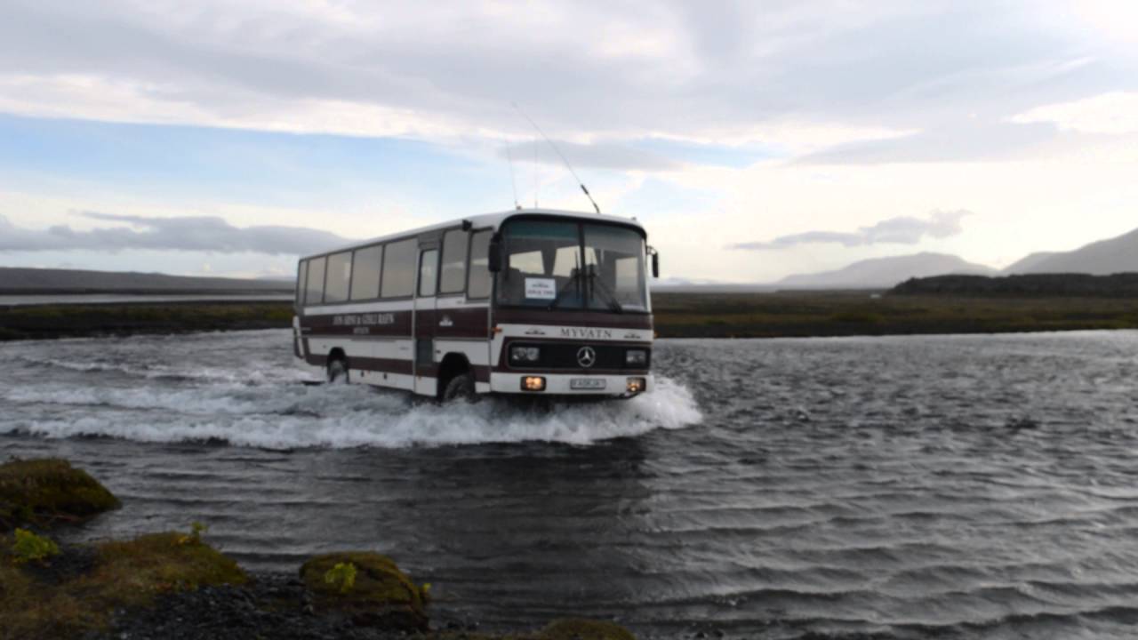 4x4 Mercedes Bus crossing river in Iceland on our way to Volcano Askja ...